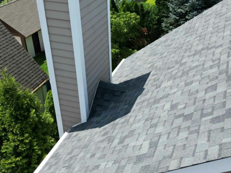 What Is A Chimney Cricket? - Novalis Roofing And Siding